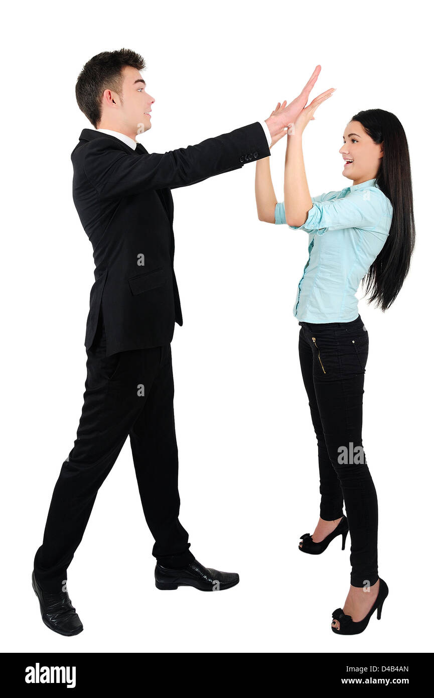 Isolated young business couple victory Stock Photo - Alamy
