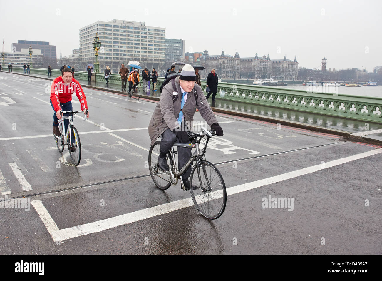 Mayor BORIS JOHNSON and Olympic cyclist CHRIS BOARDMAN cycle through ...