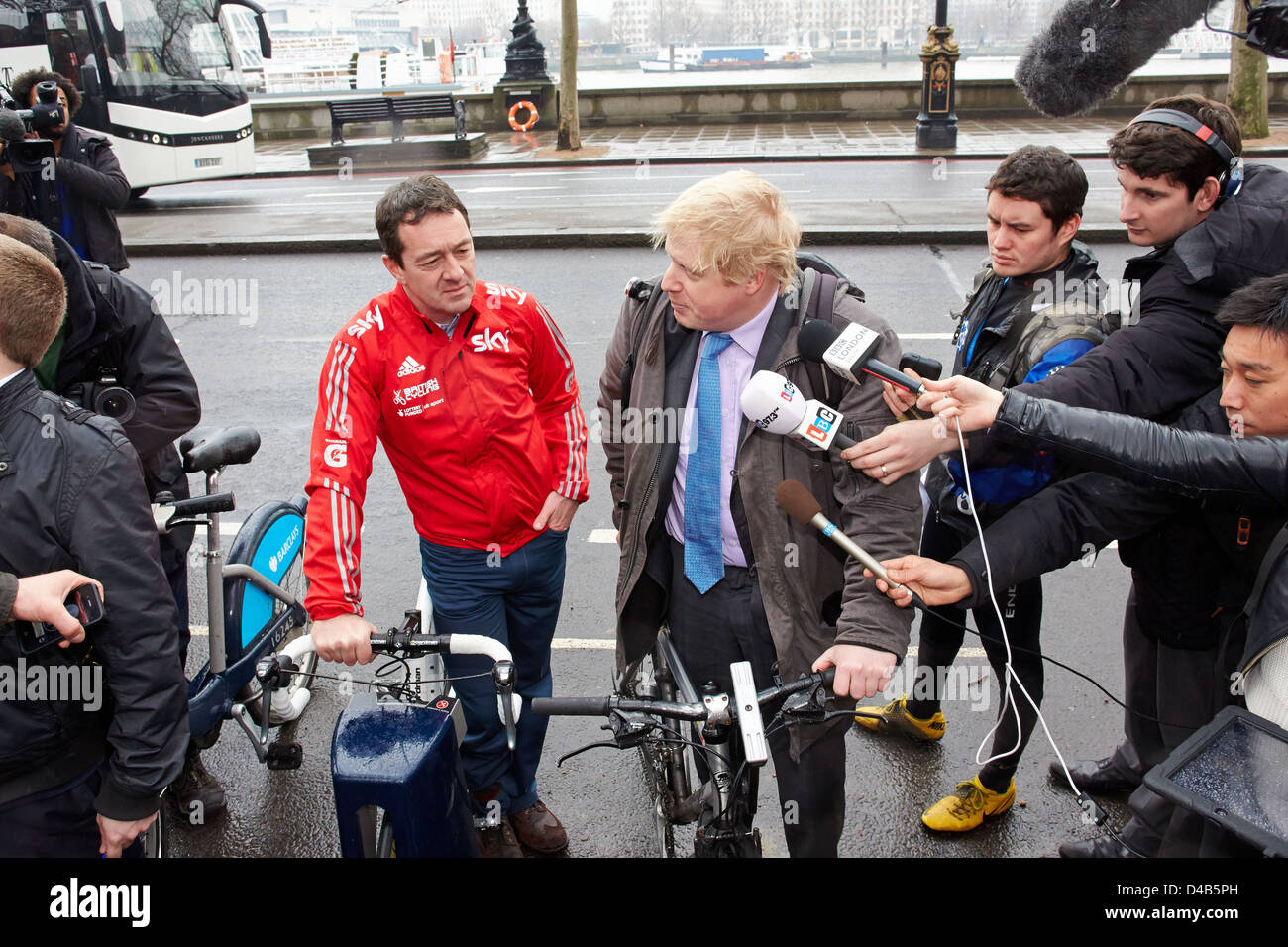 Mayor BORIS JOHNSON and Olympic cyclist CHRIS BOARDMAN cycle through ...