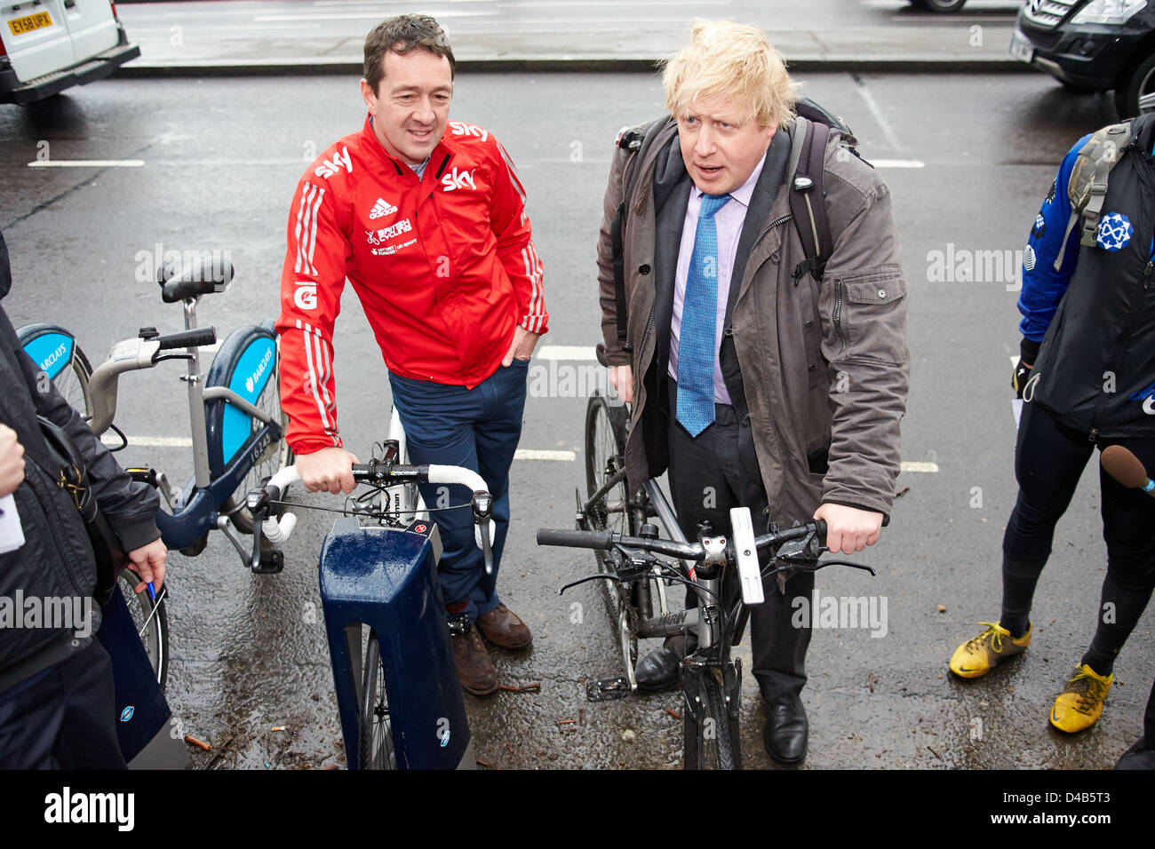 Mayor BORIS JOHNSON and Olympic cyclist CHRIS BOARDMAN cycle through ...
