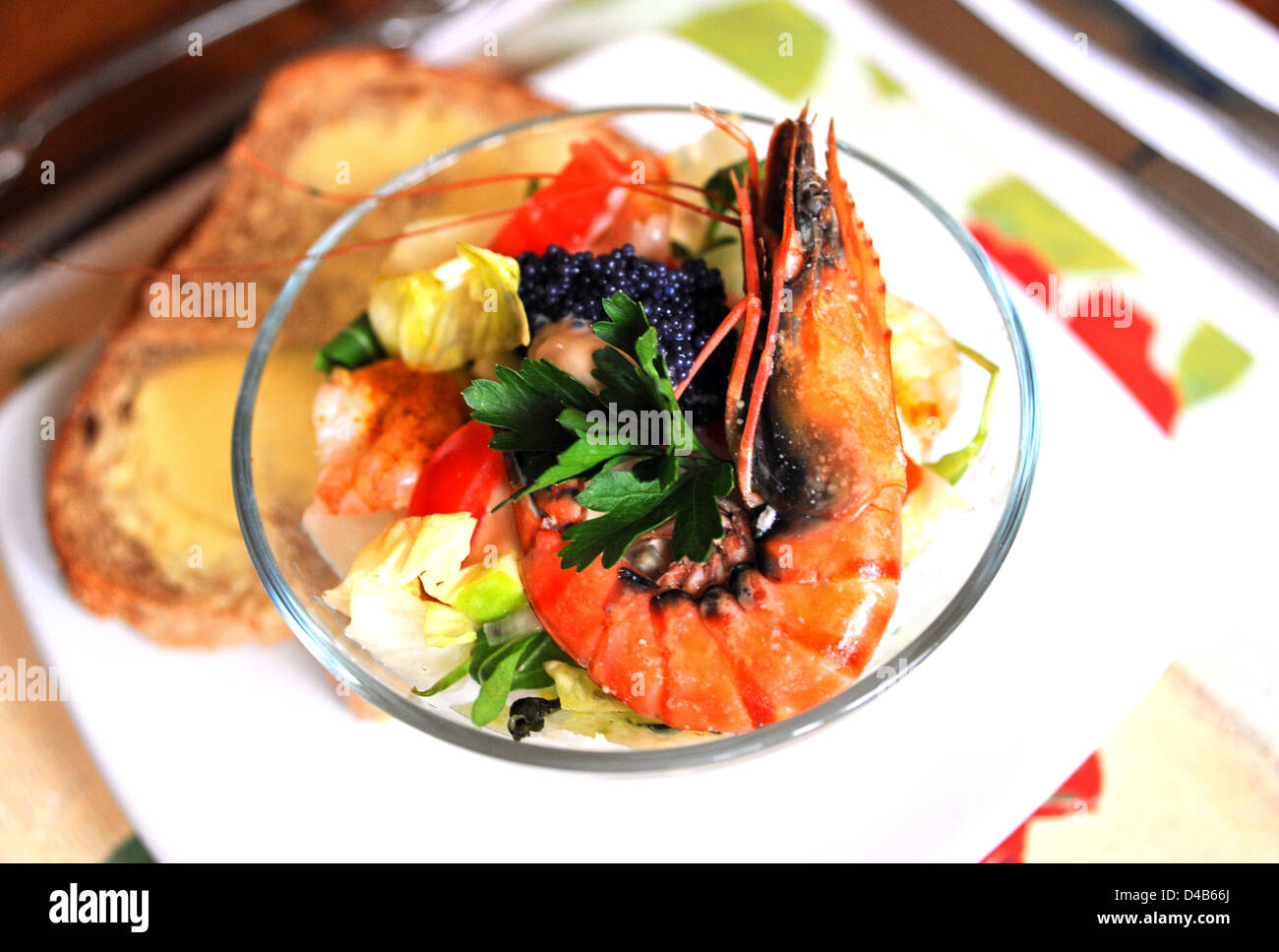 Home made prawn cocktail using tiger prawns in shell with lump fish ...