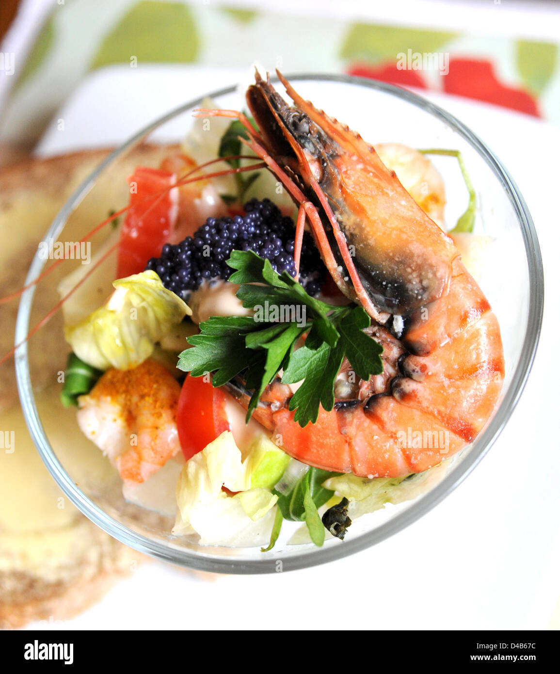 Home made prawn cocktail using tiger prawns in shell with lump fish ...