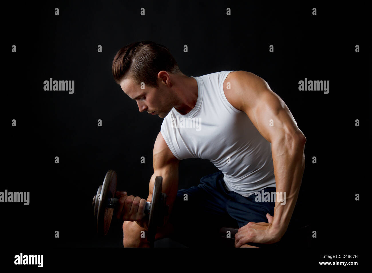 Dumbbell lifts hi-res stock photography and images - Alamy