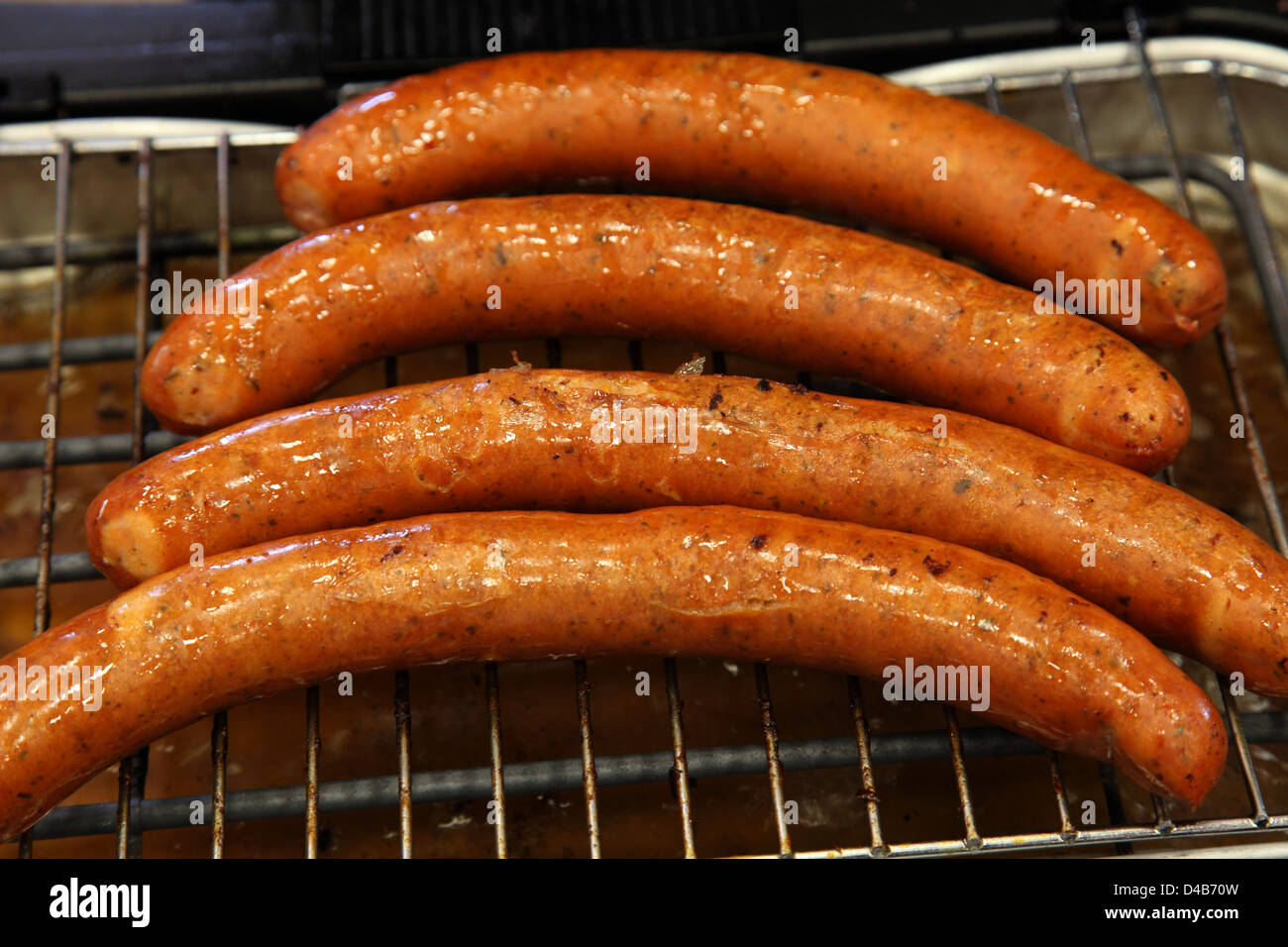sausages on fire Stock Photo - Alamy