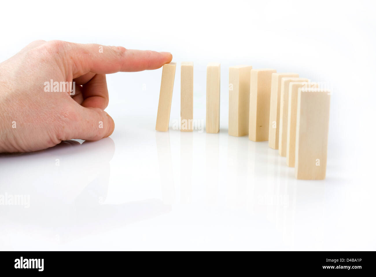 Hand and falling pieces on white background Stock Photo - Alamy