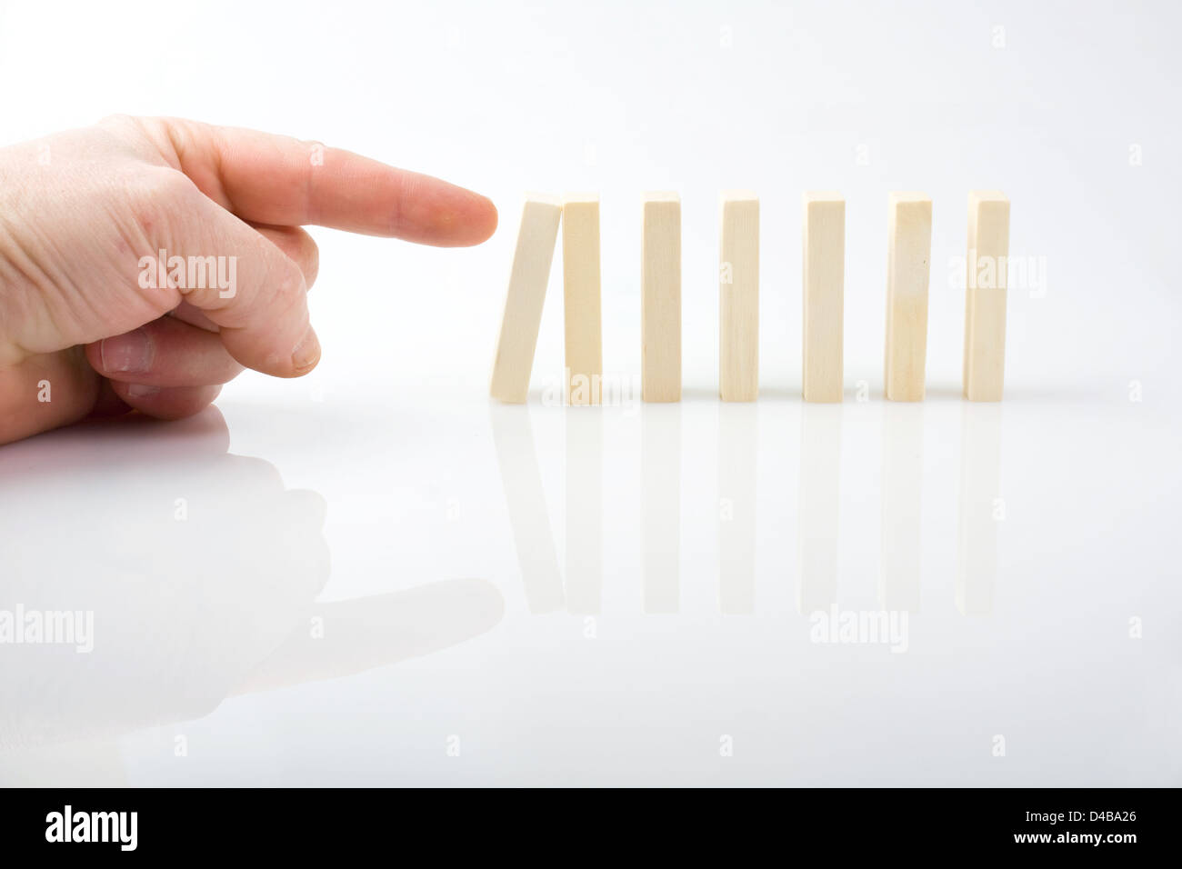 Hand and falling pieces on white background Stock Photo - Alamy