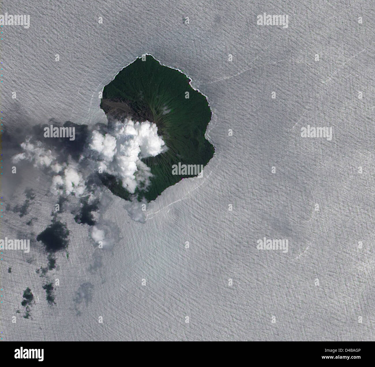 A steam and ash plume is observed rising from Tinakula Island, an ...