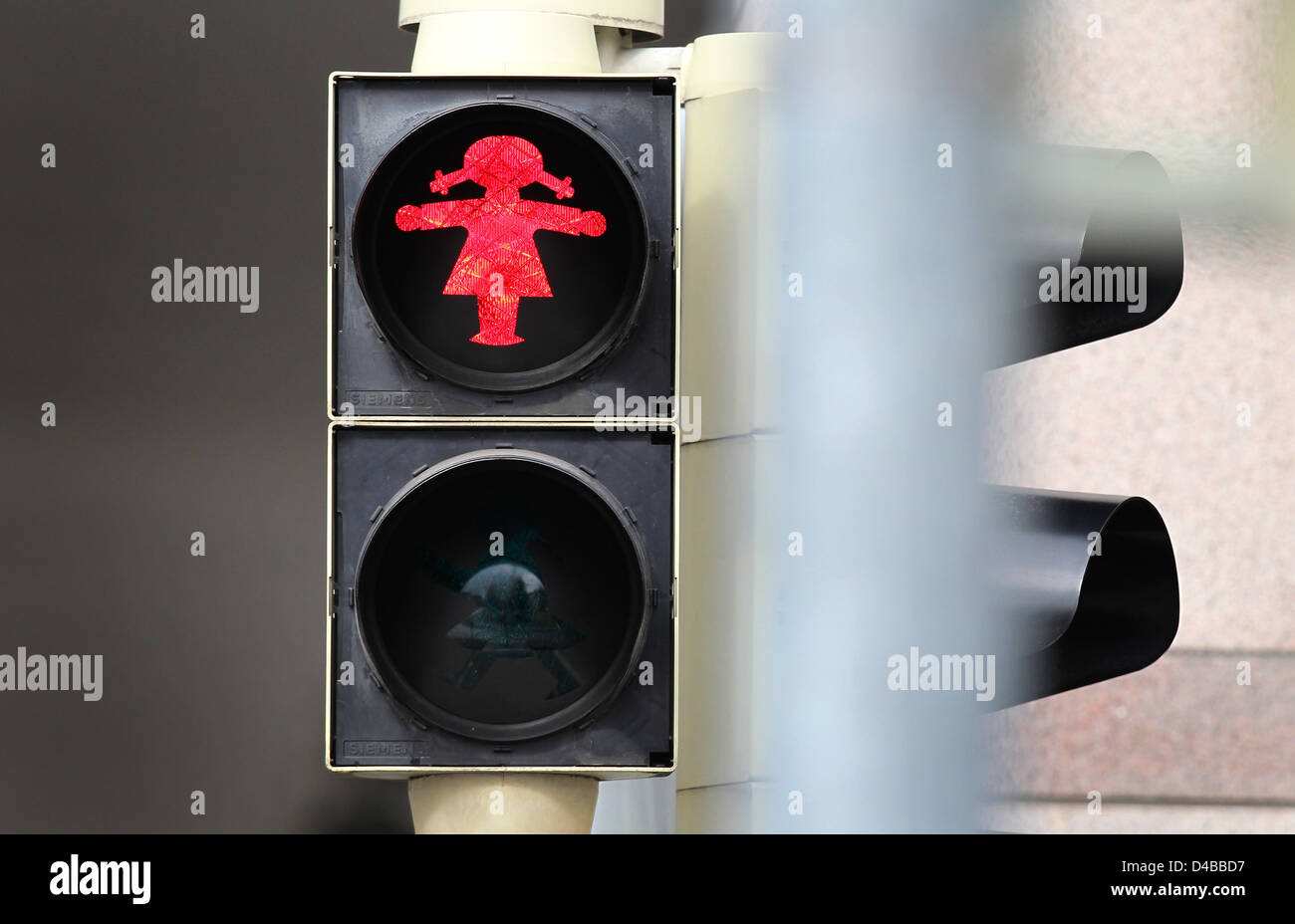 A red lit-up female cross-walk figure is pictured in Sonthofen, Germany ...