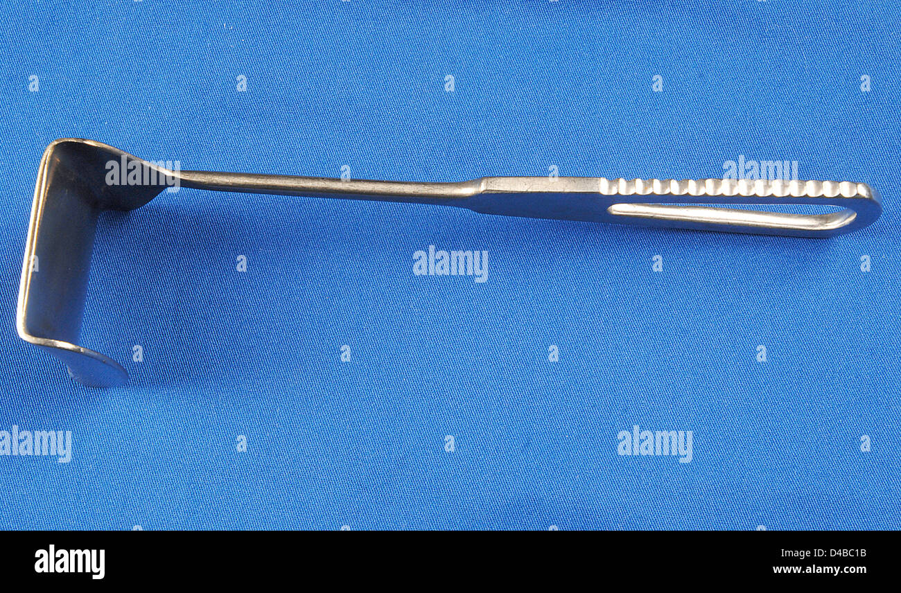This handheld retractor is used to maintain wound exposure during a ...
