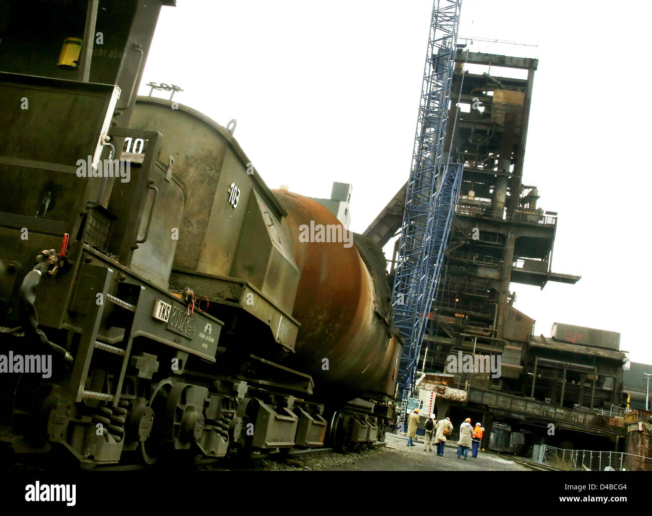 A torpedo car loaded with molten pig iron is shunted up to blast ...