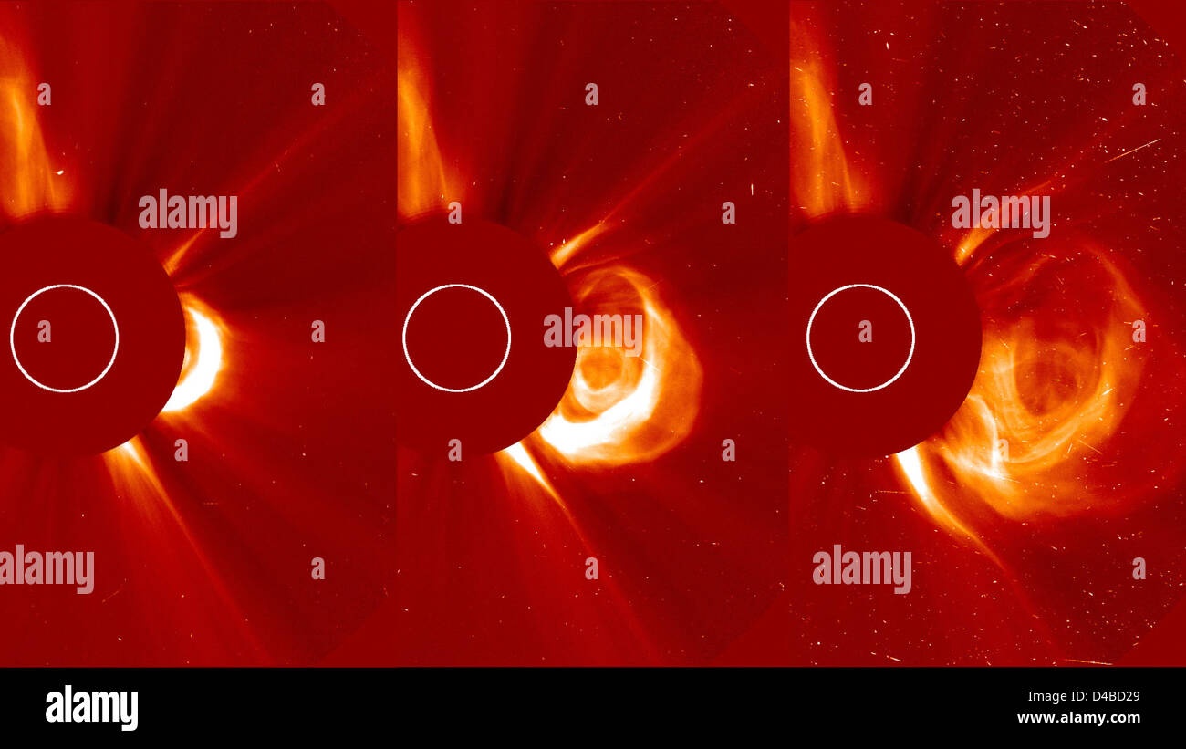 A massive coronal mass ejection (CME) erupts from the Sun, captured by ...