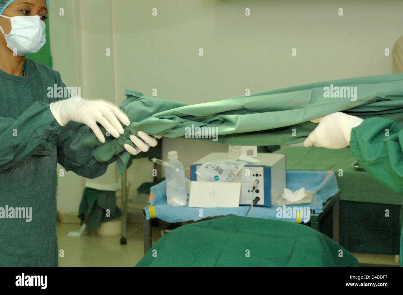 Surgeons preparing for surgery Stock Photo - Alamy