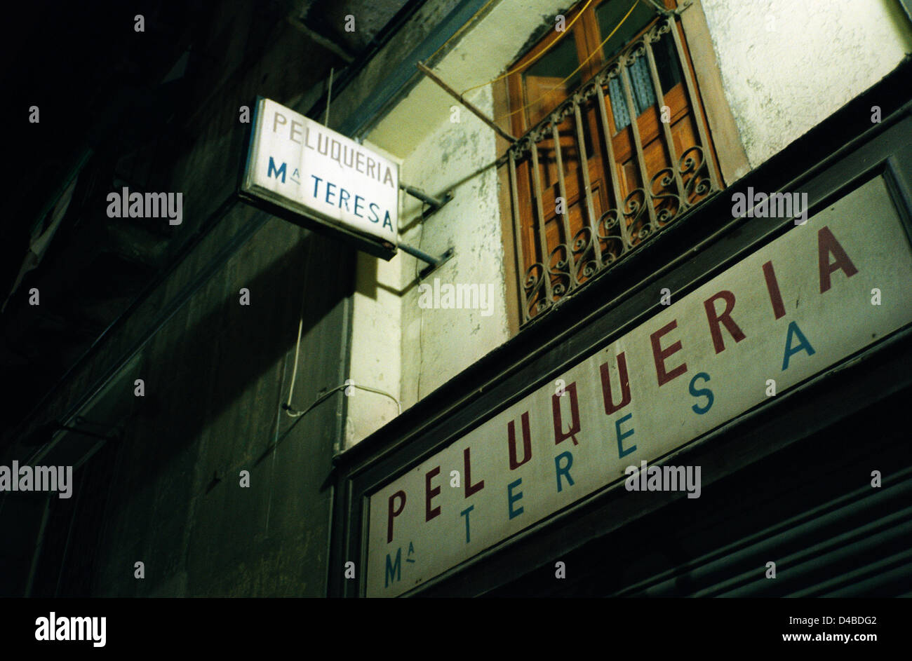 Shop sign, night, Barcelona, Spain Stock Photo - Alamy