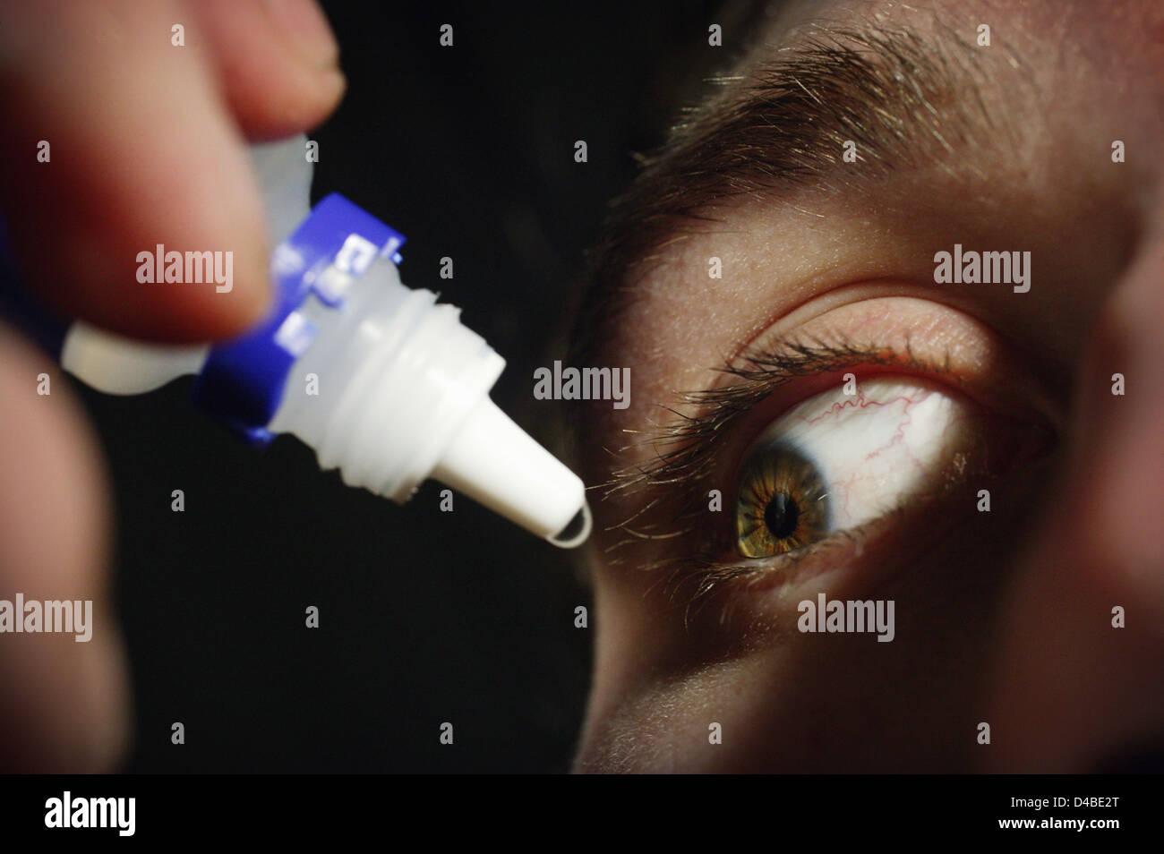 The eye drops act as a medicated solution and disenfect the eyes Stock ...