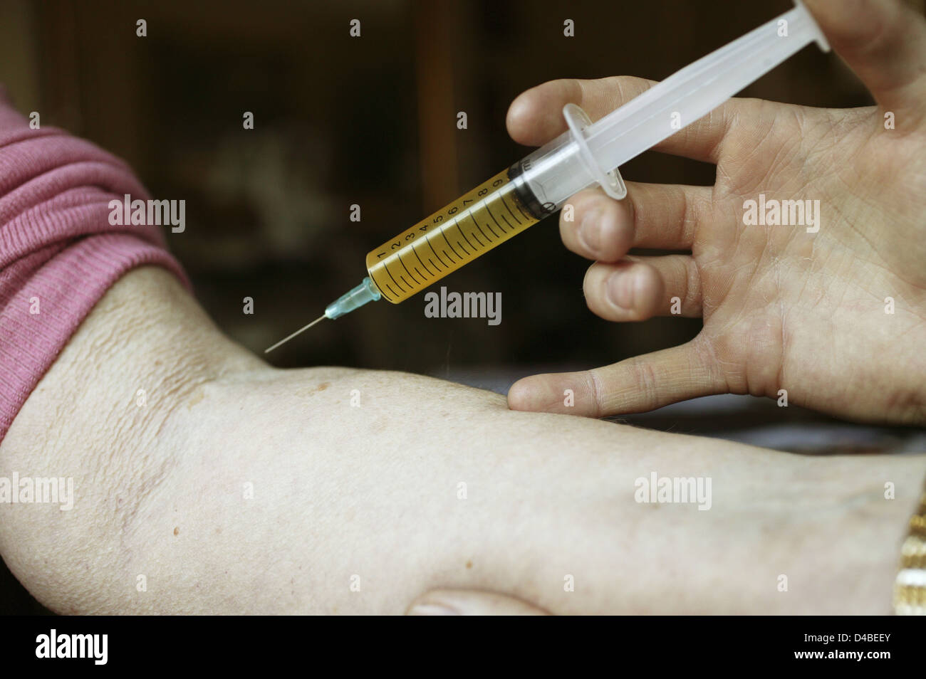 Elderly patient receiving injection, close-up Stock Photo - Alamy