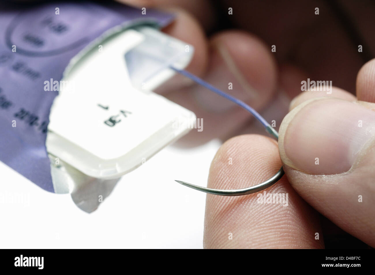 Suture needle hi-res stock photography and images - Alamy