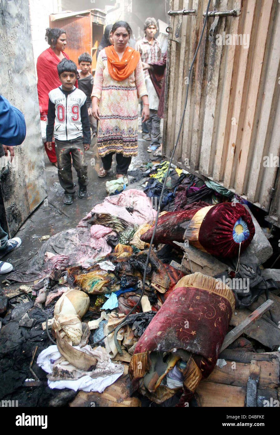 Christian family of Joseph Colony seen their demolish house by an angry ...