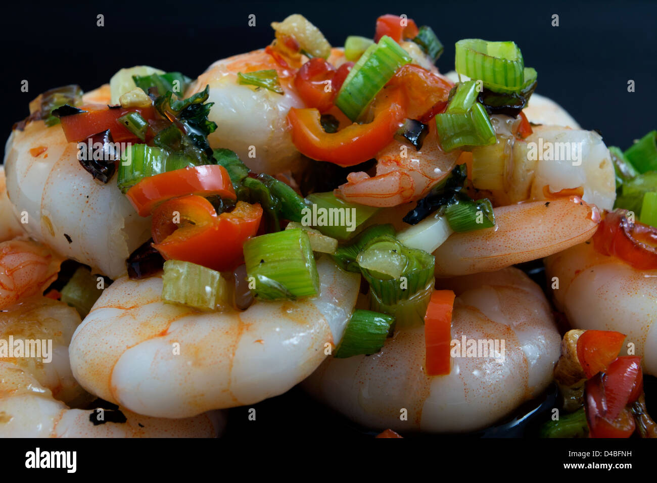Stir fried King prawns with spring onions, red peppers and coriander ...