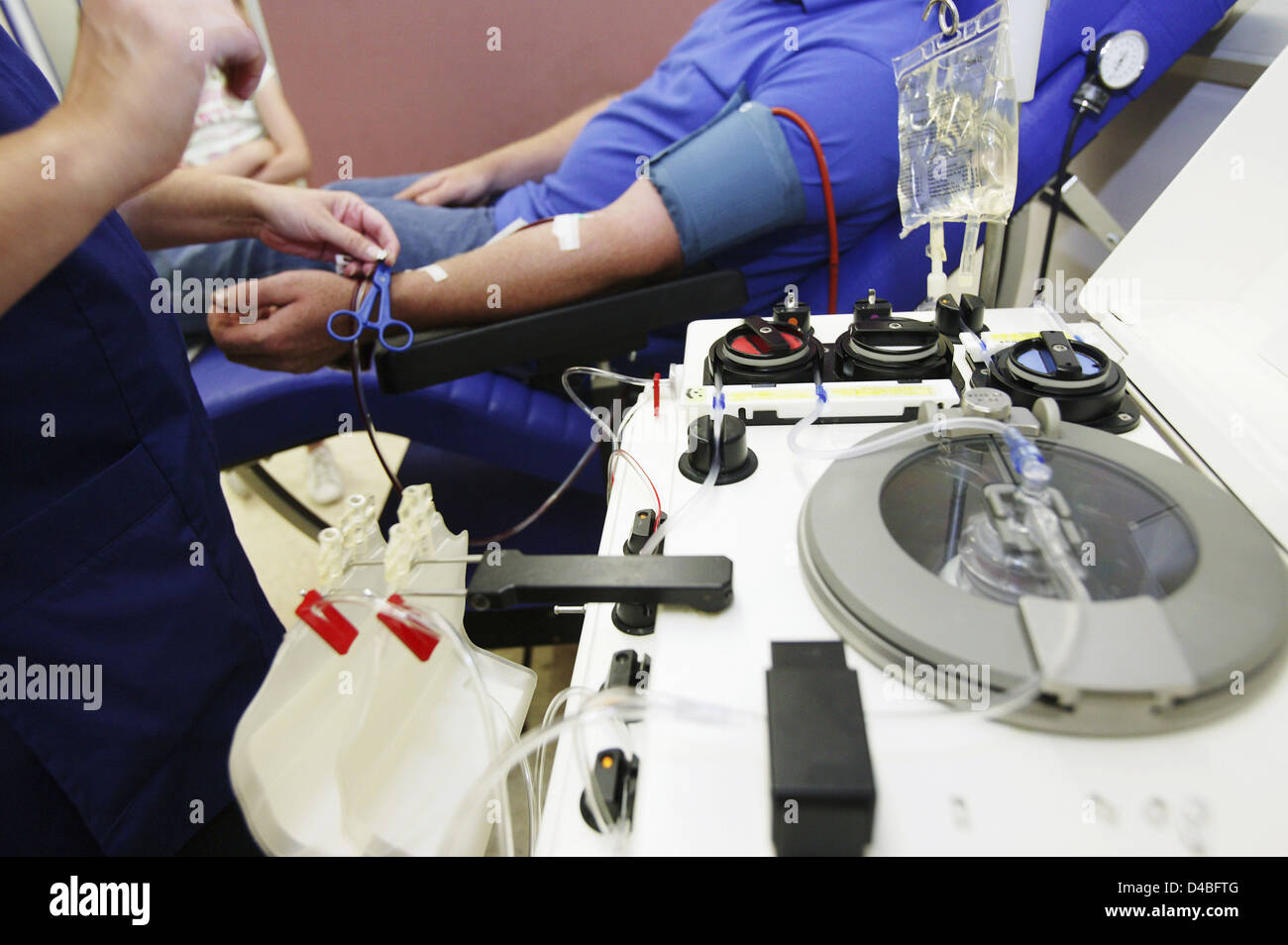 National Blood Service nurse connecting patient to Haemonetics MCS ...
