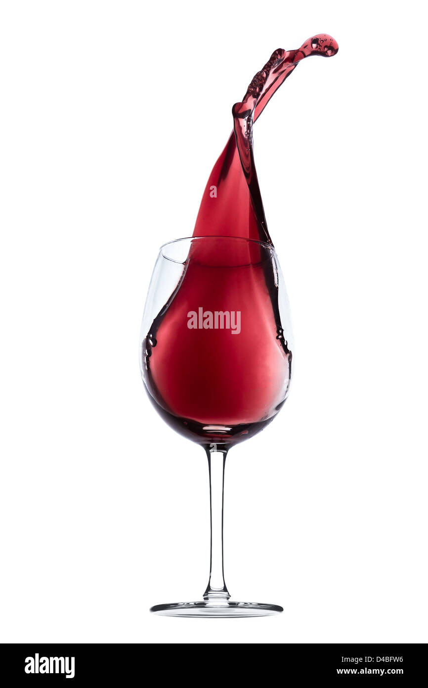 red wine splashing out of a glass, isolated on white Stock Photo - Alamy
