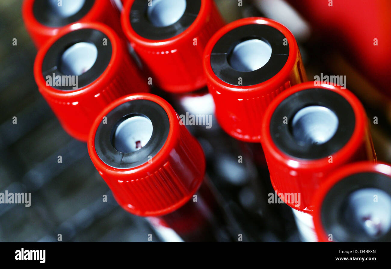Bar-coded storage tubes of donated blood ready for testing Stock Photo ...