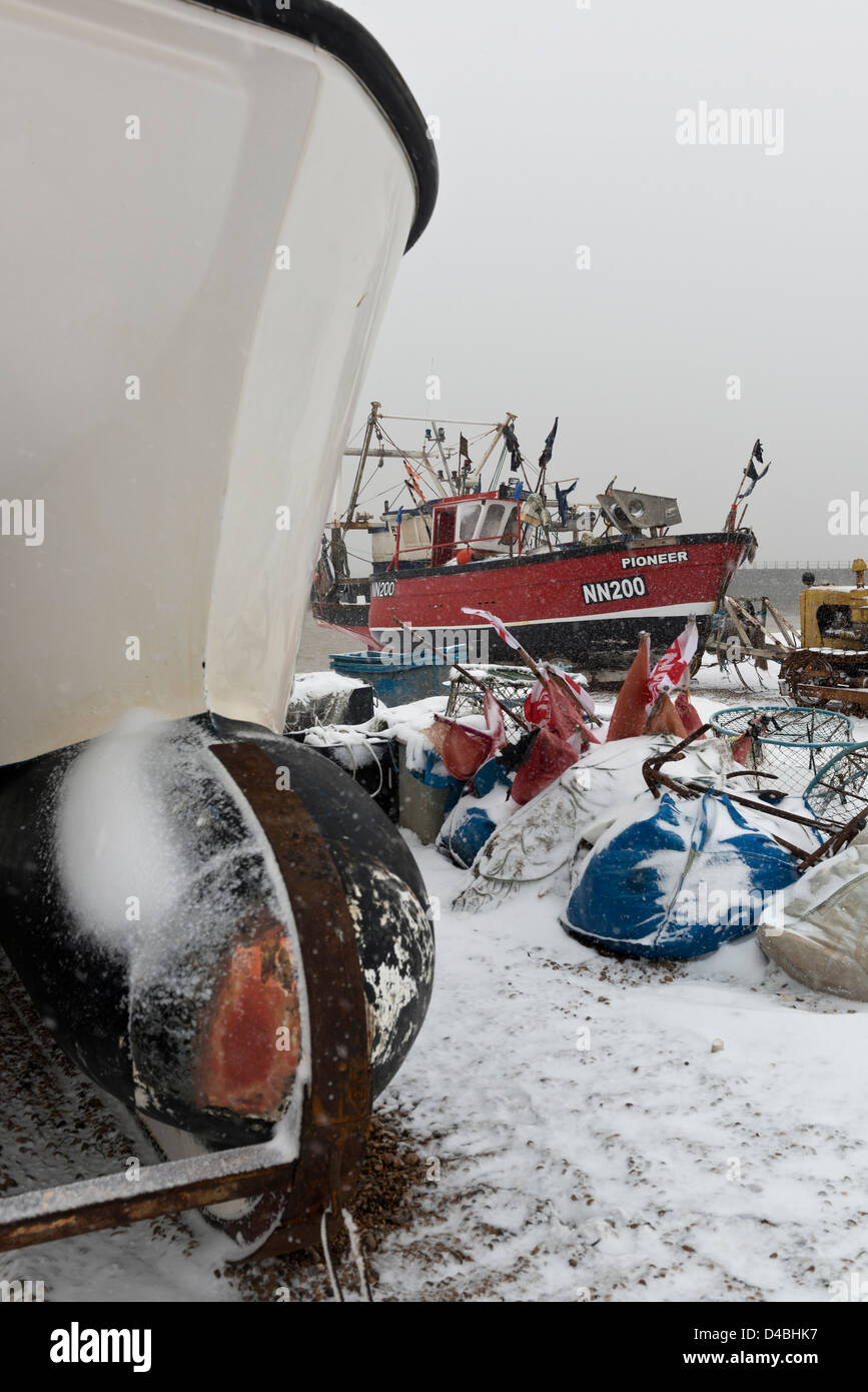 Winter snow scene of fishing boats on the Stade beach, old town ...