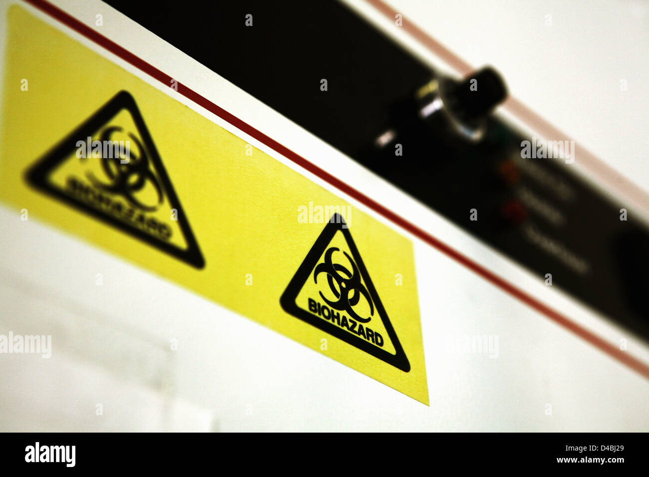 Biohazard warning sign Stock Photo - Alamy