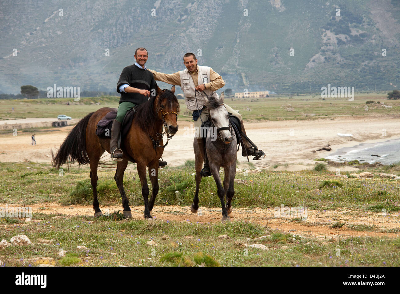 San Vito lo Capo, Italy, two cowboys on horseback Stock Photo - Alamy
