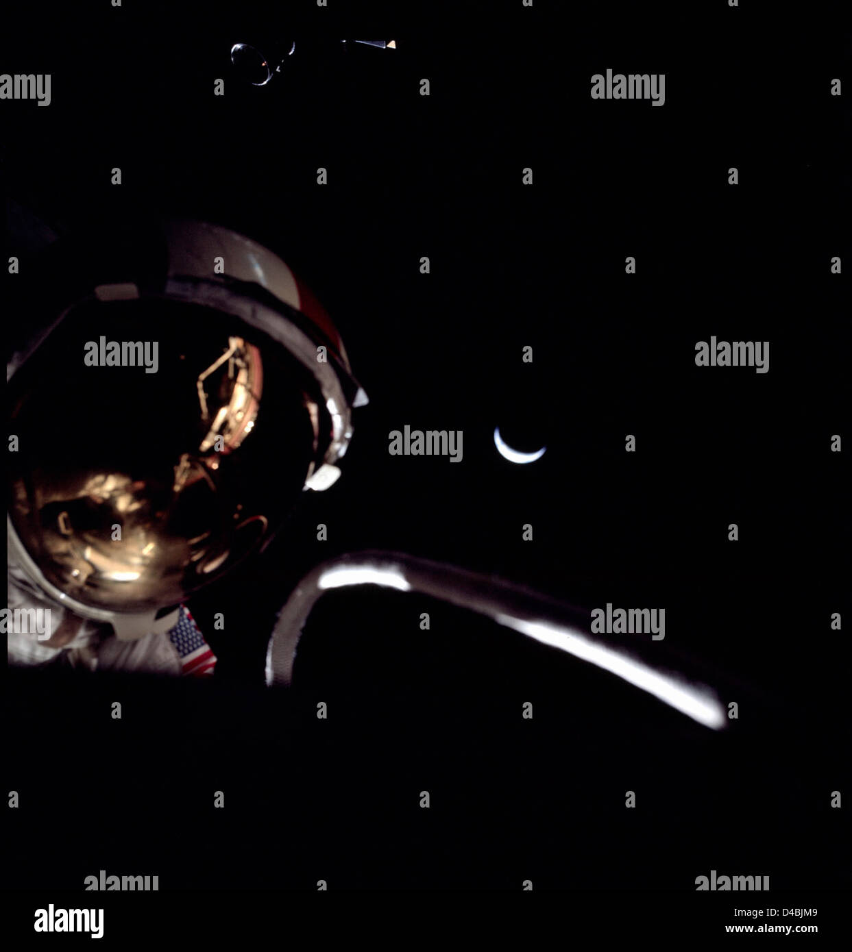 Astronaut Eugene Cernan of Apollo 17 conducts an EVA (extravehicular ...