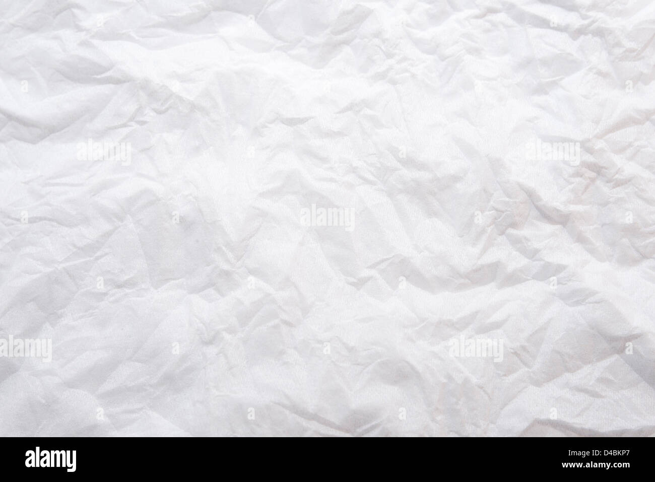 Sheet of crushed white papere Stock Photo - Alamy
