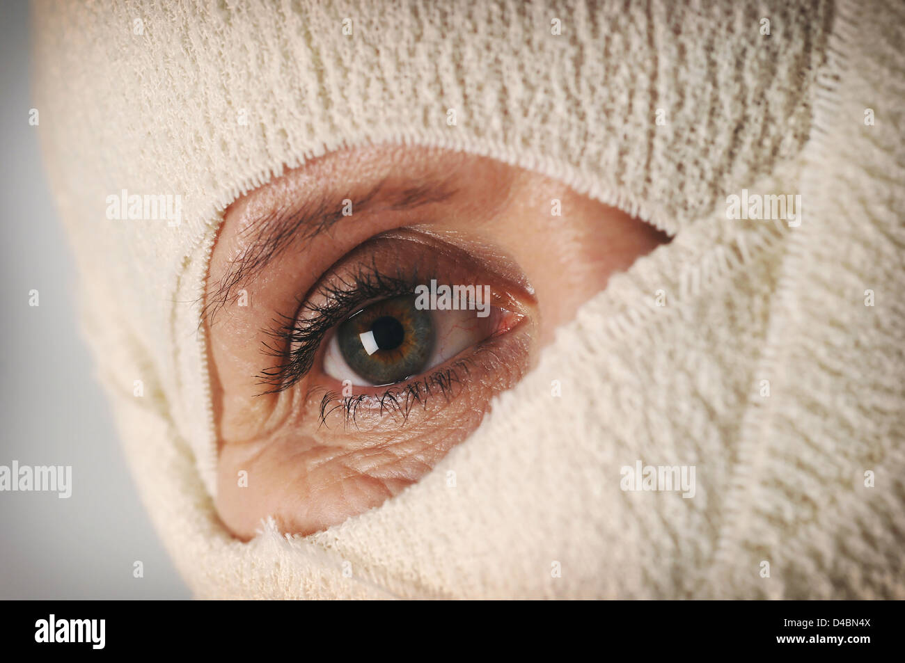 Close up view woman wearing bandage over her head hi-res stock ...