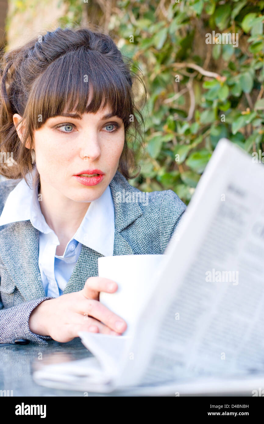 Attractive Young Business Woman Drinking Coffee At Outdoor Cafe Stock