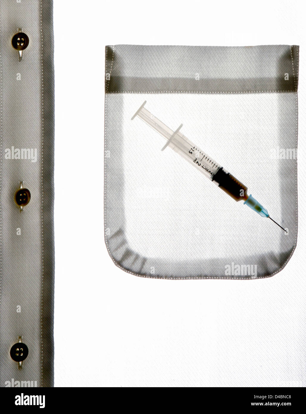 Syringe in pocket of shirt Stock Photo - Alamy