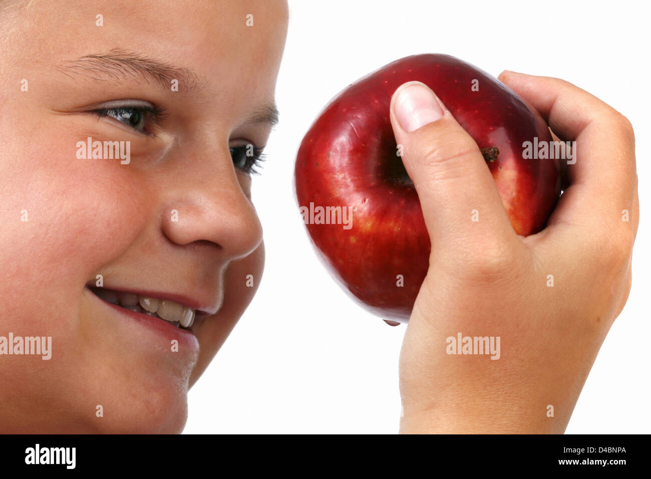 Girl holding red apple Stock Photo - Alamy Girl holding red apple Stock Photo - Alamy