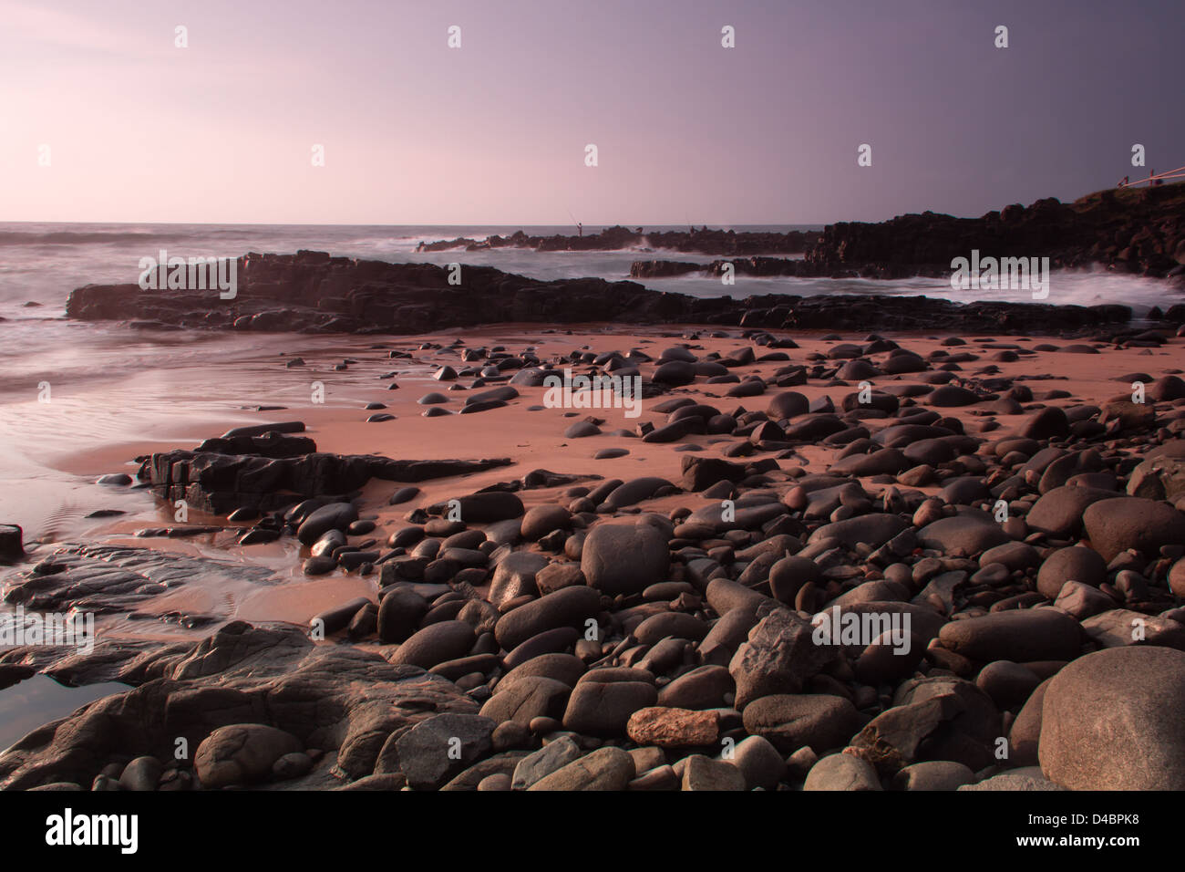 A scenic view of Ballito beach, Kwazulu Natal, warm colors of sunrise ...
