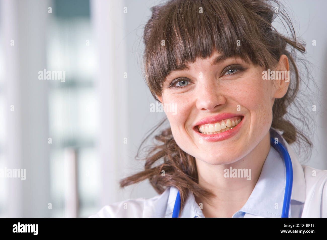 Female doctor arms crossed in a modern office Stock Photo - Alamy
