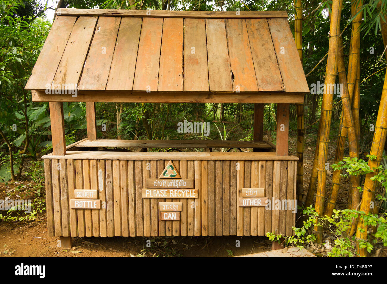A wooden rubbish station provides bins for disposal of litter and ...
