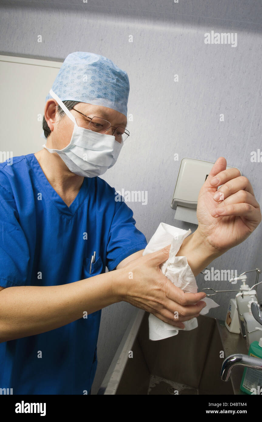 Surgeon washing hands before surgery Stock Photo - Alamy