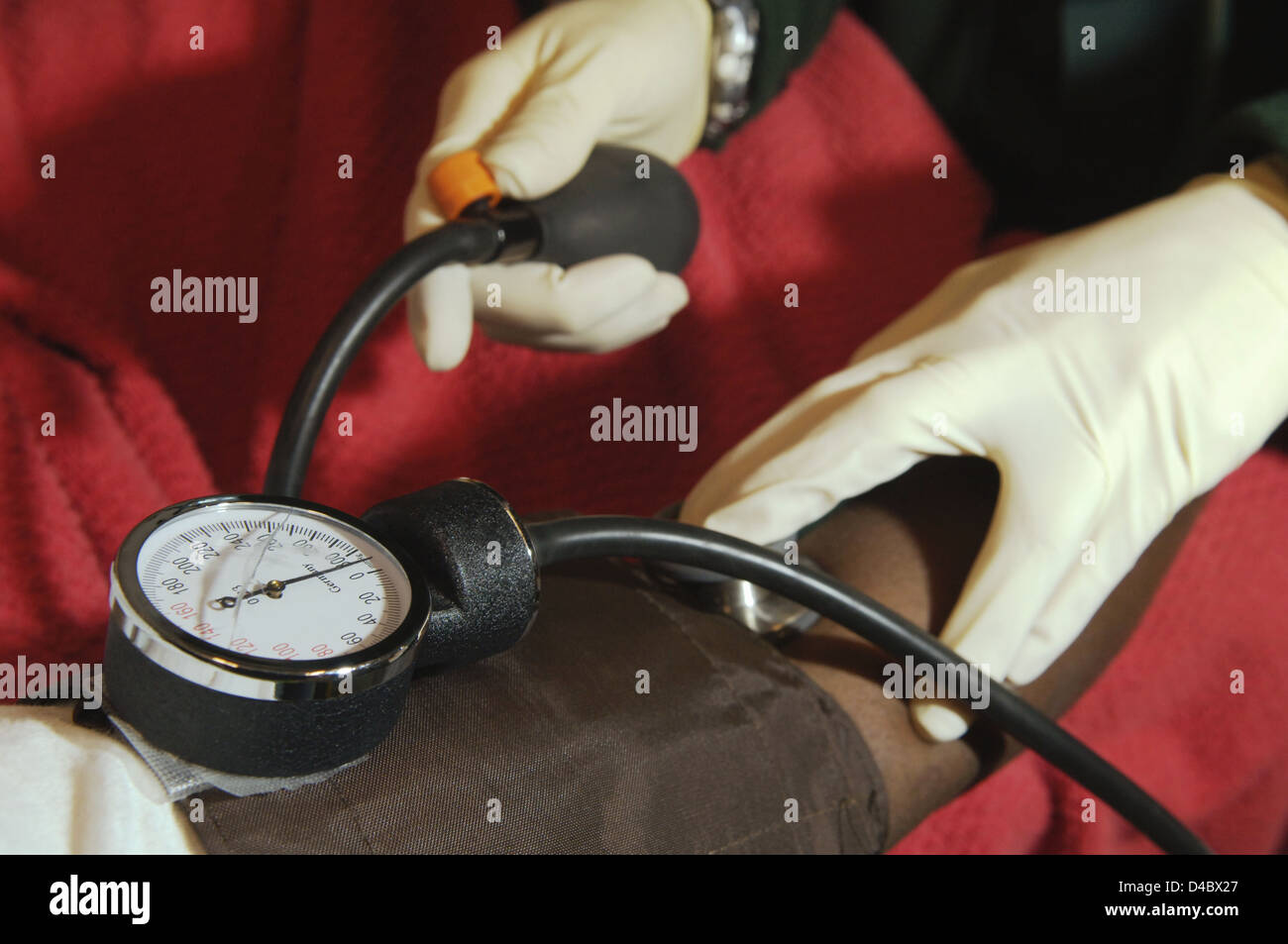 Paramedic measuring blood pressure of patient Stock Photo - Alamy Paramedic measuring blood pressure of patient Stock Photo - Alamy