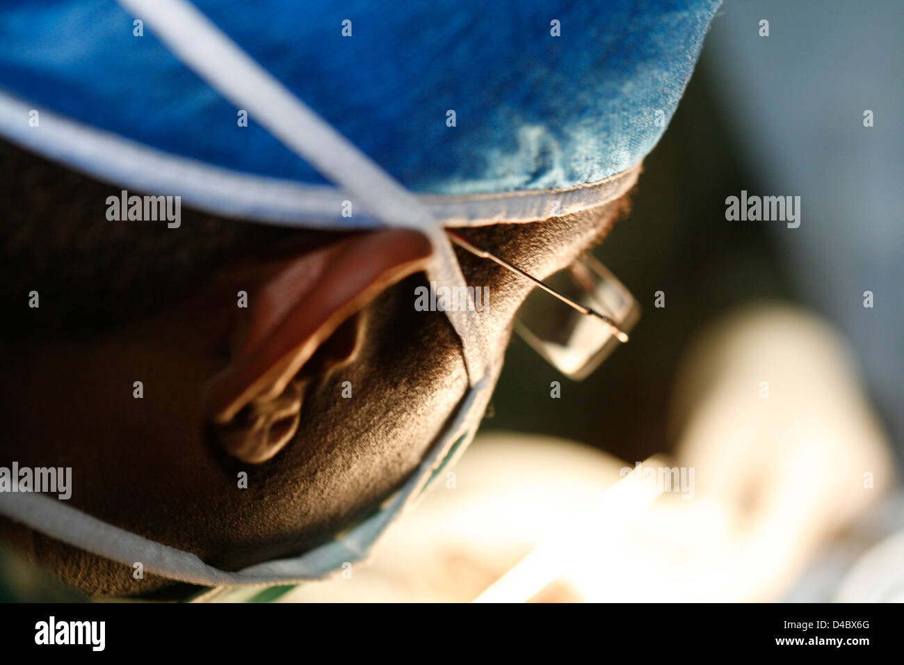 Close-up of back of surgeon's head and face Stock Photo - Alamy