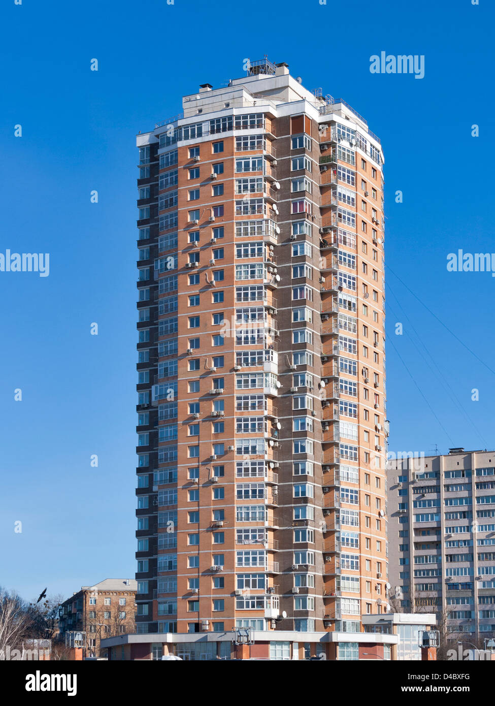 Newly constructed modern apartment skyscraper building Stock Photo - Alamy