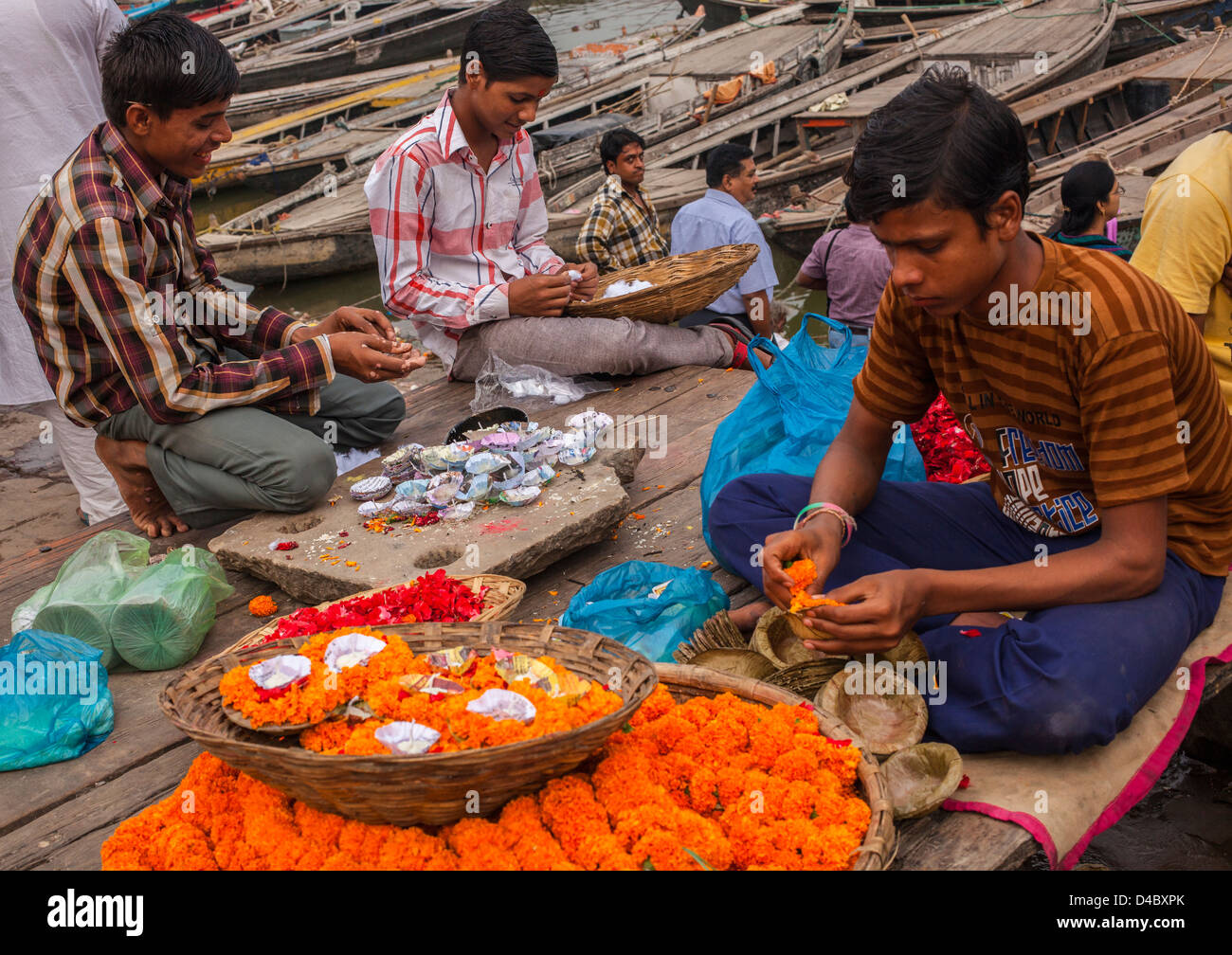 Child selling flowers hi-res stock photography and images - Alamy