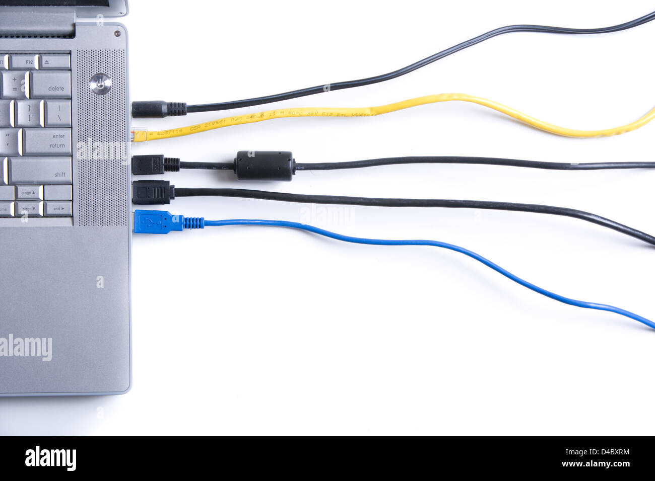 Wires connected to a modern laptop isolated on white Stock Photo - Alamy