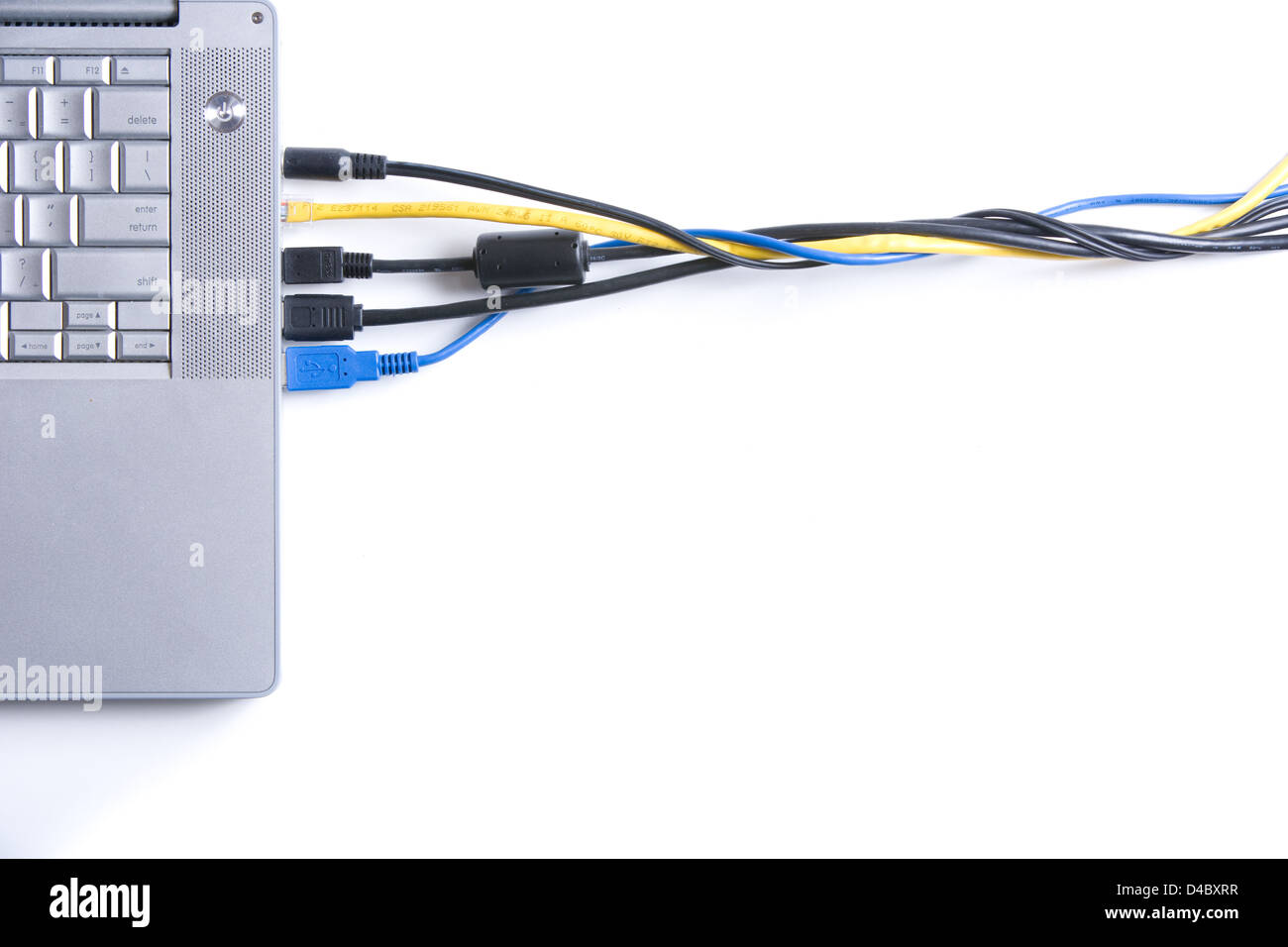 Wires connected to a modern laptop isolated on white Stock Photo - Alamy