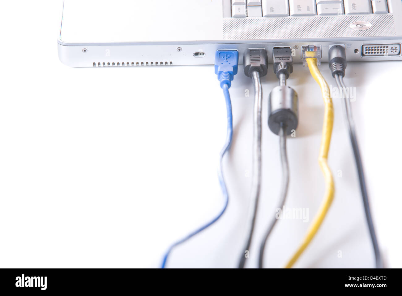 Wires connected to a modern laptop isolated on white Stock Photo - Alamy