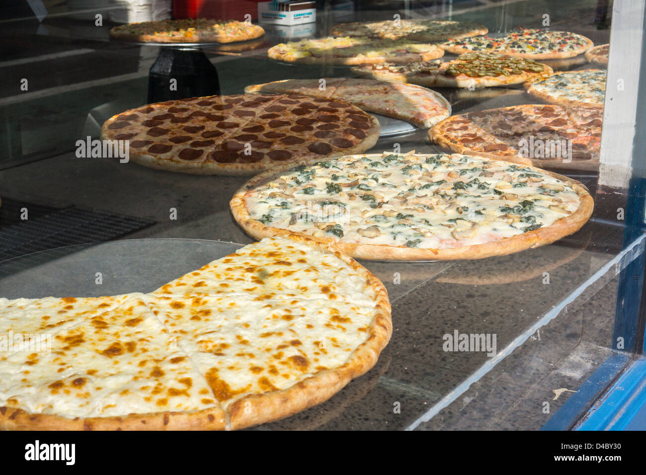Pizza pies on display in pizzeria in New York on Sunday, March 9, 2013 ...