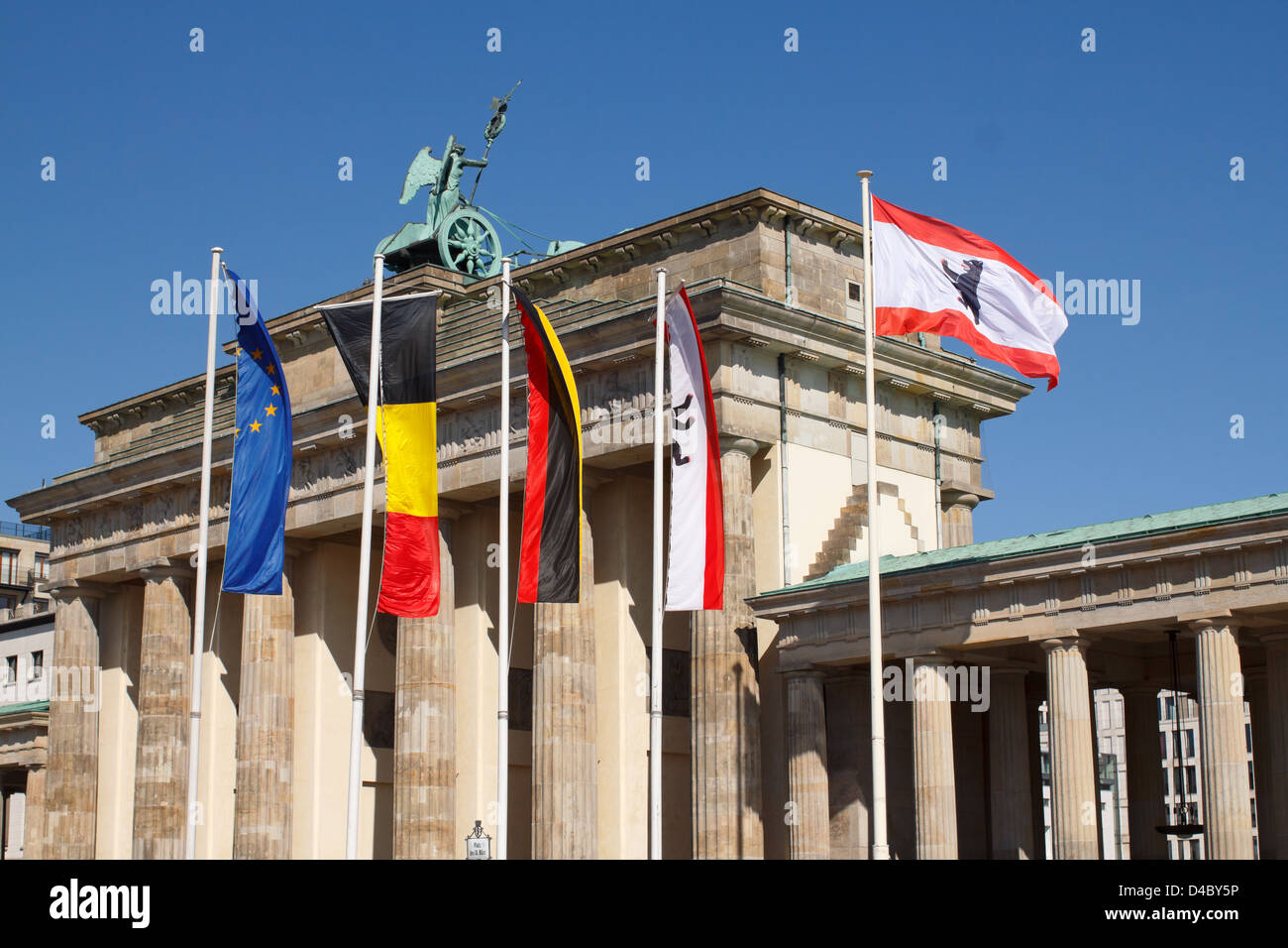 Berlin, Germany, hoisted flags on the Brandenburg Gate Stock Photo - Alamy