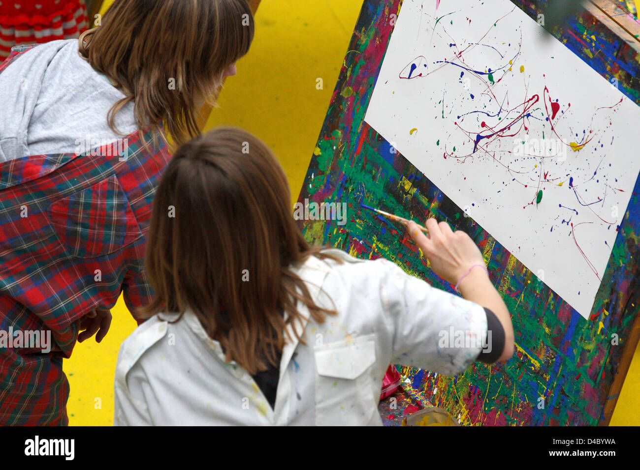 Leipzig, Germany, children are active as an artist at the Leipzig Book ...