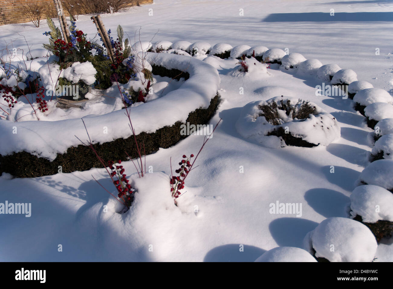 A circular flower bed is covered in snow Stock Photo - Alamy