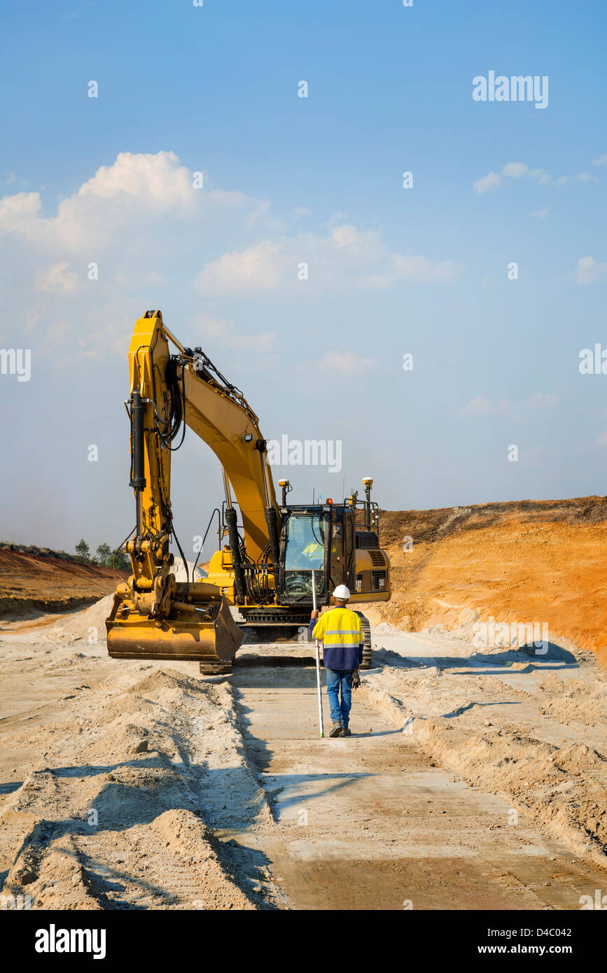 Construction workers excavator pipeline construction hi-res stock ...